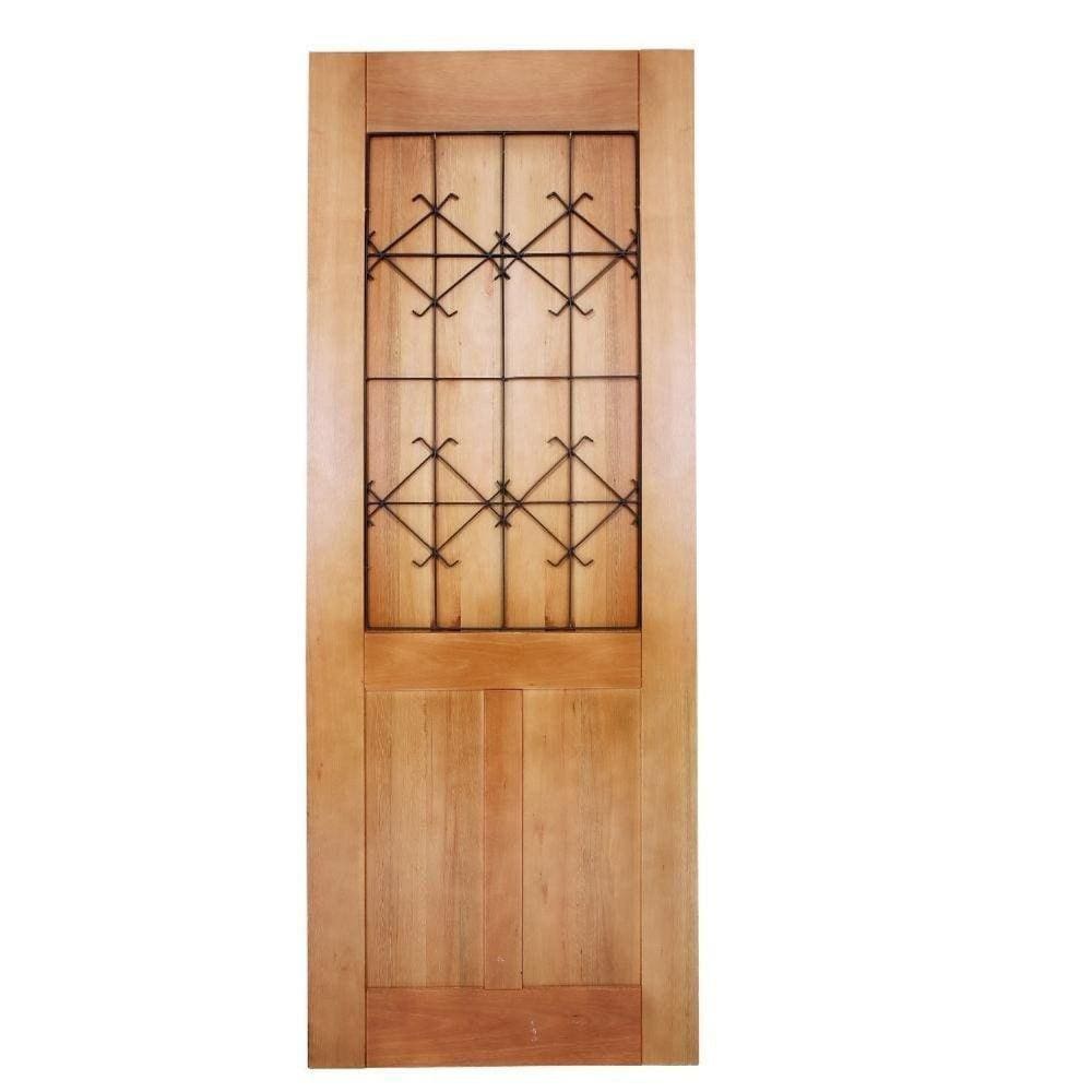 Porta madeira macica realeza com grade cedro arana | Casas Bahia
